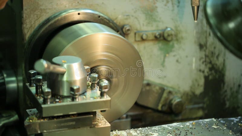 Running a Milling Machine with CNC and a Flow of Cutting Fluid. Stock ...