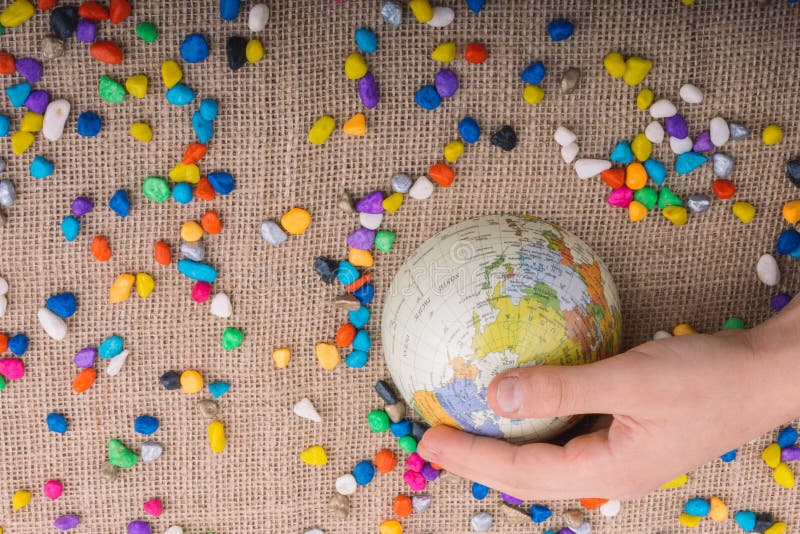Little Model Globe Amid Colorful Pebbles Stock Photo - Image of world ...