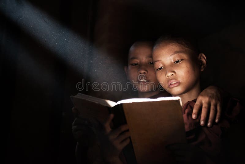 Little monks reading book stock image. Image of classroom - 30569325