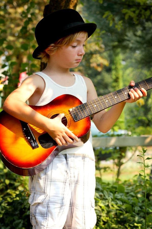 Little Music Man with Derby Hat Stock Photo - Image of accessory, sing ...