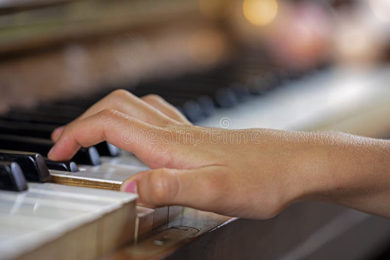 Little Pianist Plays the Piano with His Right Hand, Horizontal Stock ...