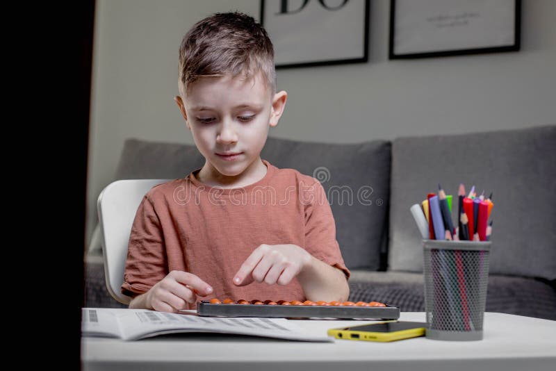 Little Preschooler Counting Large Numbers on His Fingers Using Mental ...