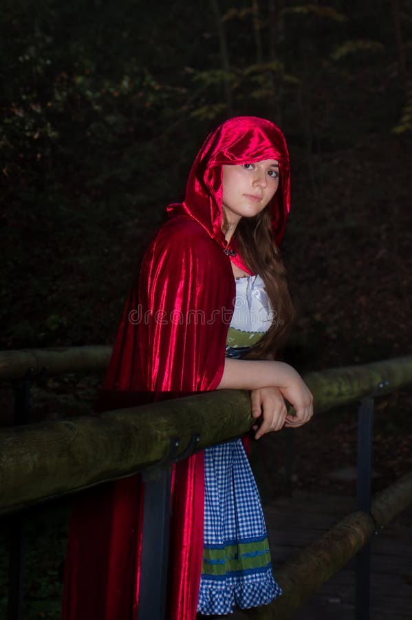 Little Red Riding Hood Standing on a Bridge Stock Image - Image of ...