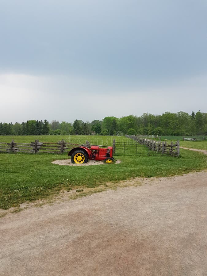 Little Red Tractor stock photo. Image of grass, farm - 72086298