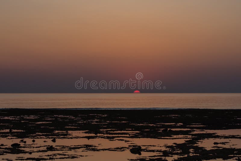 Little Rising Red Sun at the Sea Stock Photo - Image of beauty, blue ...