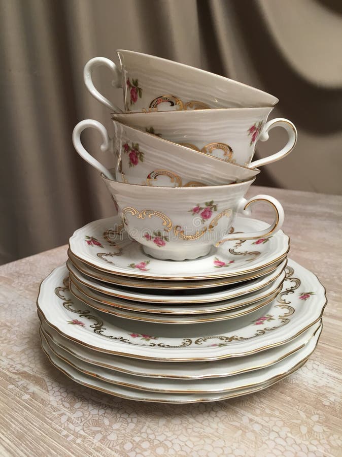 Set of cups an saucers stock image. Image of saucers - 107173791
