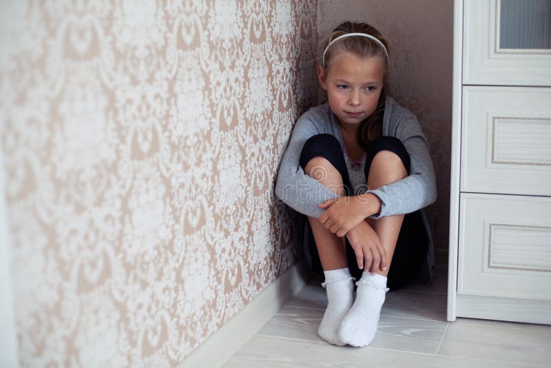Sad Little Girl Sitting Corner Stock Photos - Free & Royalty-Free Stock ...