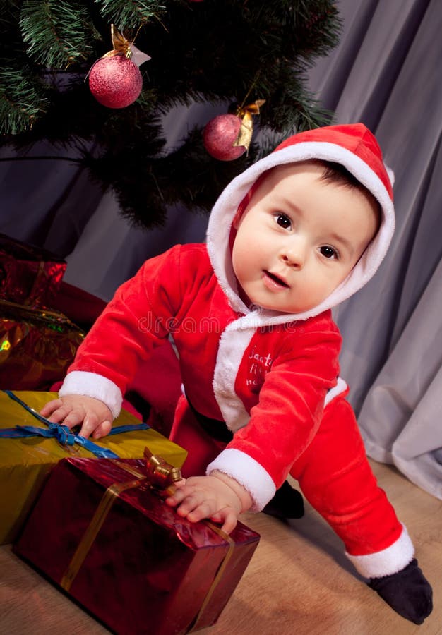 Little Santa Boy with Gift Boxes. Stock Image - Image of smiling ...