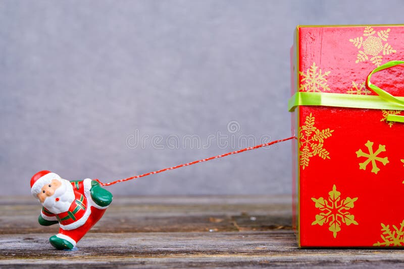 Little Santa Claus Pulling Big Gift Box Stock Image - Image of ...