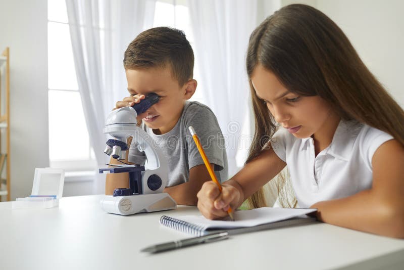 Girl Studying Something Microscope Stock Photos - Free & Royalty-Free ...