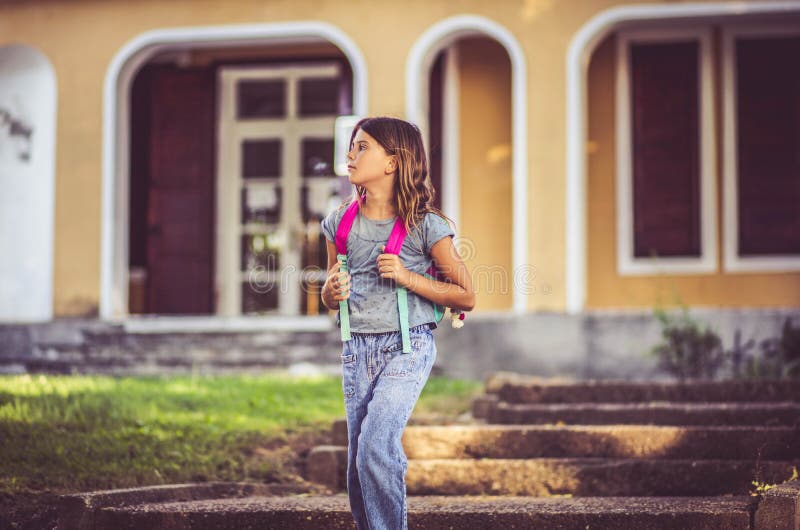 Girl Leaving for School on Fall Morning, with Bag on Back Stock Image ...