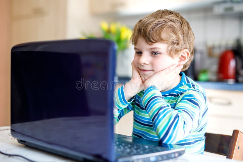 Little School Kid Boy Making School Homework on Computer. Child Having ...