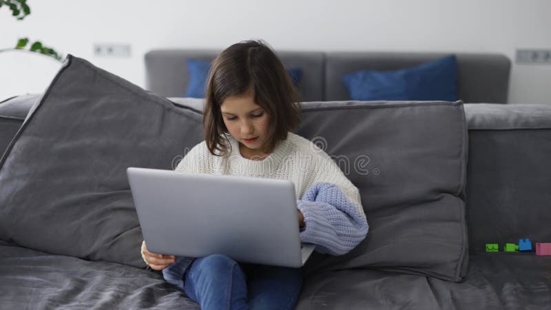 Little School Kid Girl Use Laptop Computer Sitting on Sofa Stock ...