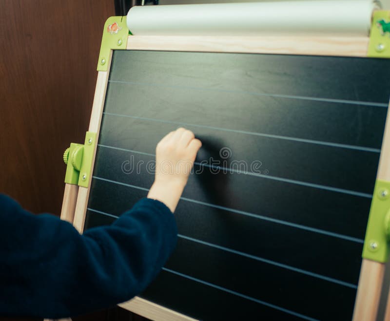 Little Schoolboy Writing on Blackboard at Home Stock Image - Image of ...