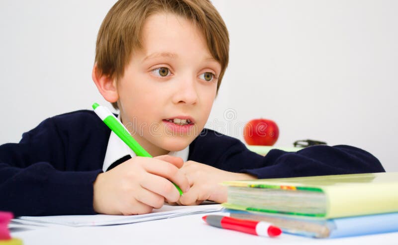 Boy doing school work stock image. Image of primary, grade - 4981171