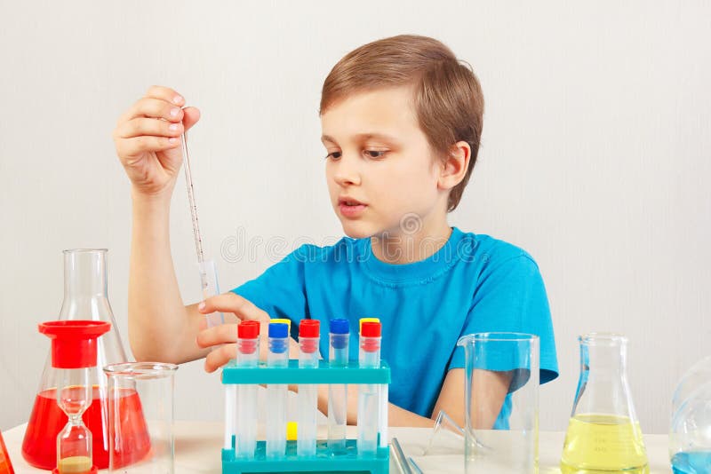 Little Scientist Doing Chemical Experiments in Laboratory Stock Image ...