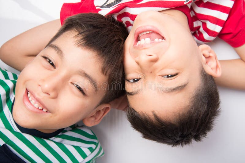 Little Sibling Boy Lay on the Pillow Together Happy Face Stock Photo ...