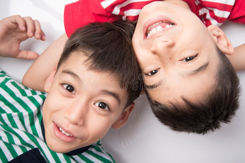 Little Sibling Boy Lay on the Pillow Together Happy Face Stock Photo ...