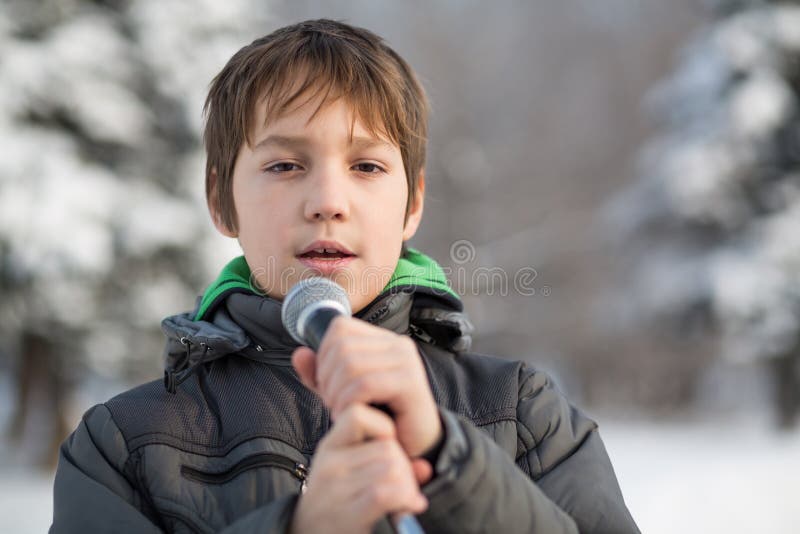 The Little Singer in a Jacket Sing Outdoors Stock Photo - Image of ...