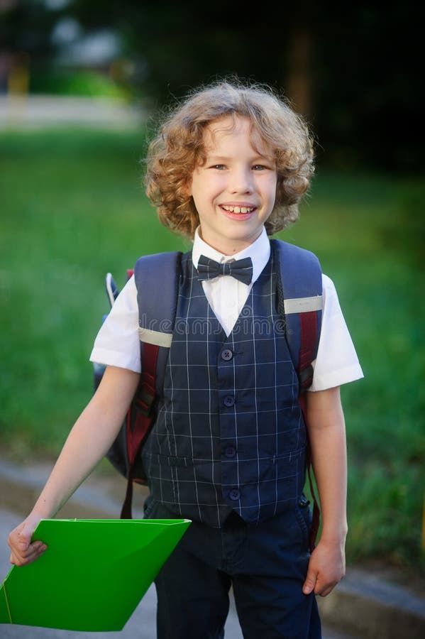 Little Smart First Grader in the School Yard. Stock Image - Image of ...