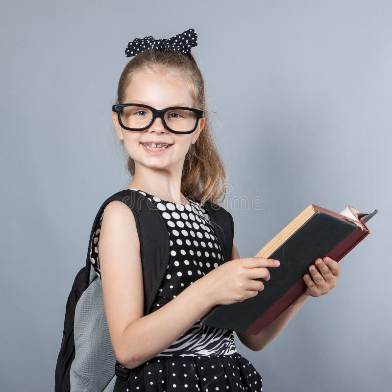 Little Smart Girl Reading a Book Stock Image - Image of preparing ...