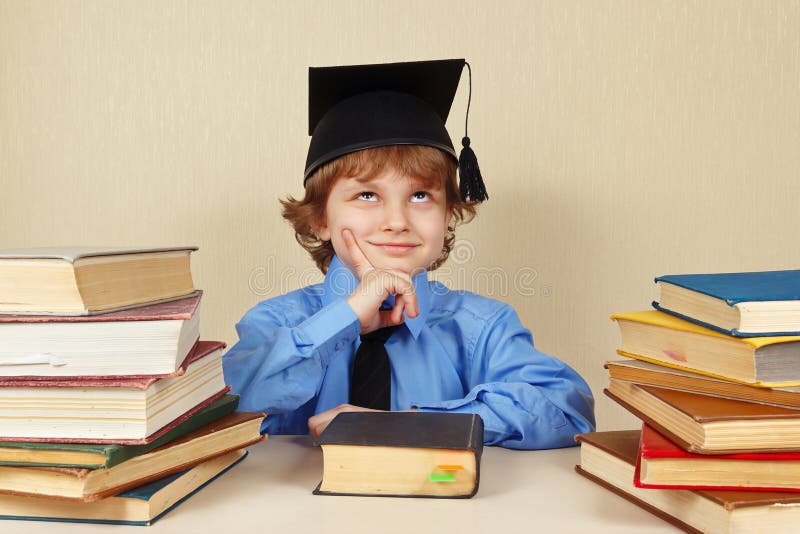 Little Smiling Boy in Academic Hat among Old Books Stock Photo - Image ...