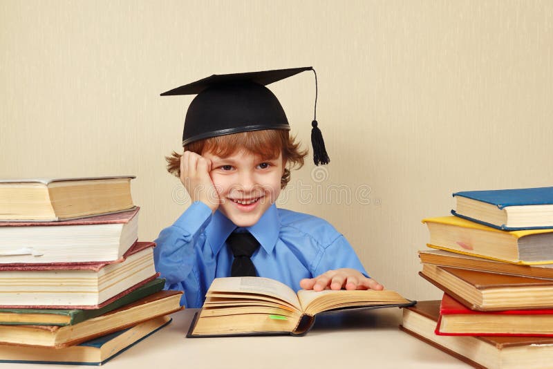 Little Smiling Boy In Academic Hat Studies Old Books Stock Image ...