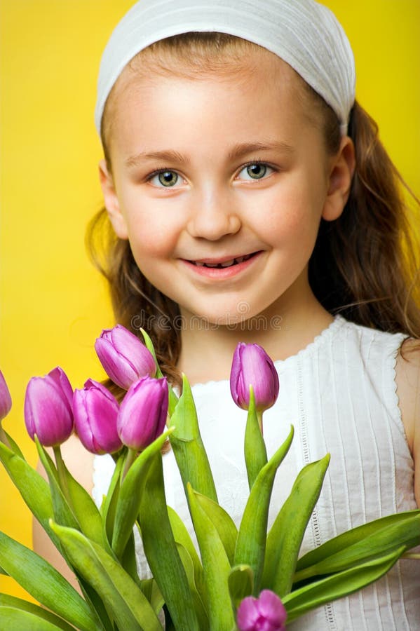 Little Smiling Girl with Flowers Stock Photo - Image of lovely, enjoy ...