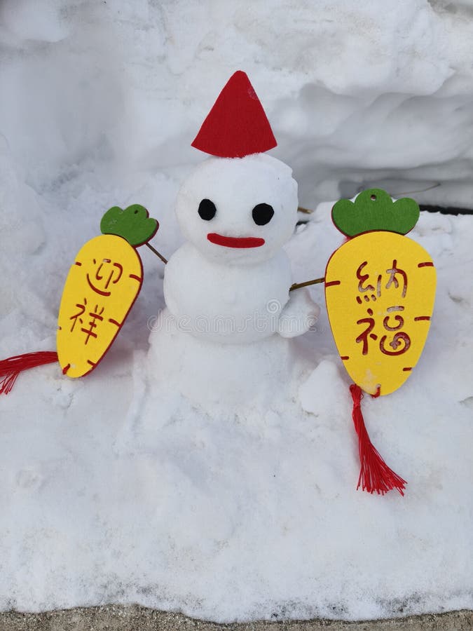 A Little Snowman with Two Blessing Decorations Stock Image - Image of ...