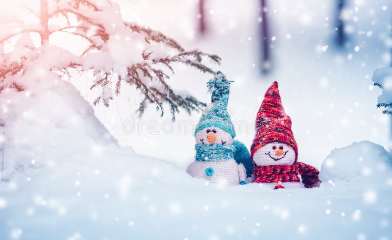 Little Snowmans on Soft Snow on Blue Background Stock Photo - Image of ...