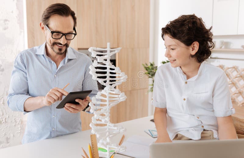 Little Son and His Father Checking Information about DNA Stock Photo ...