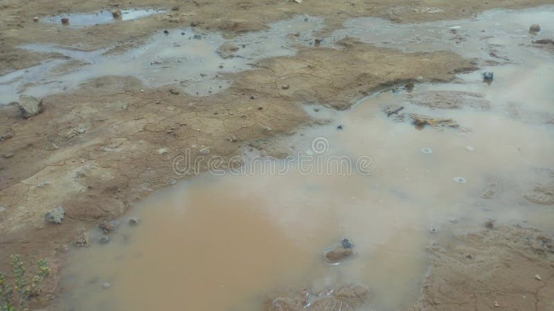A Little Standing Water after Rain on Clay Soil Stock Photo - Image of ...