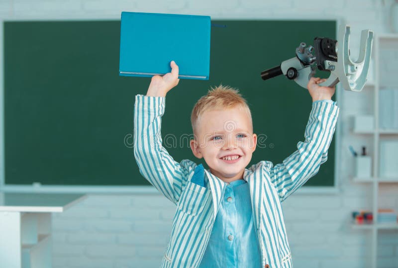 Cute Little Preschool Kid Boy Study in a Classroom. Little Ready To ...