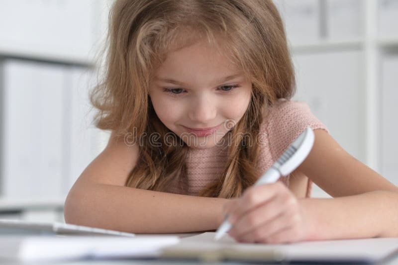 Little Student Girl Making Homework Stock Photo - Image of notes, happy ...