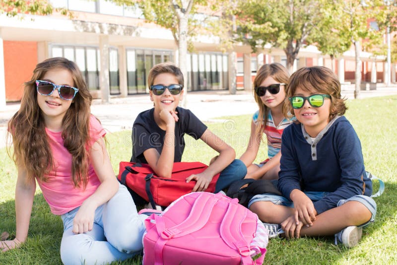 Little Students at School Campus Stock Photo - Image of park, group ...