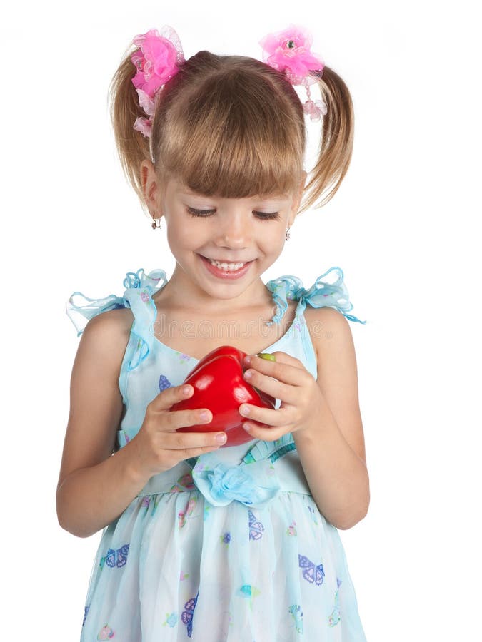 A Little Sweet Girl with a Red Pepper Stock Photo - Image of purple ...