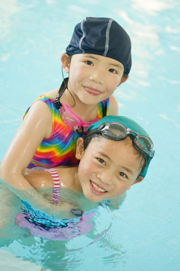 Little Swimmers stock photo. Image of water, sports, girl - 8265916