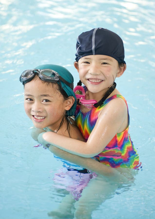 Little Swimmers stock photo. Image of water, sports, girl - 8265916