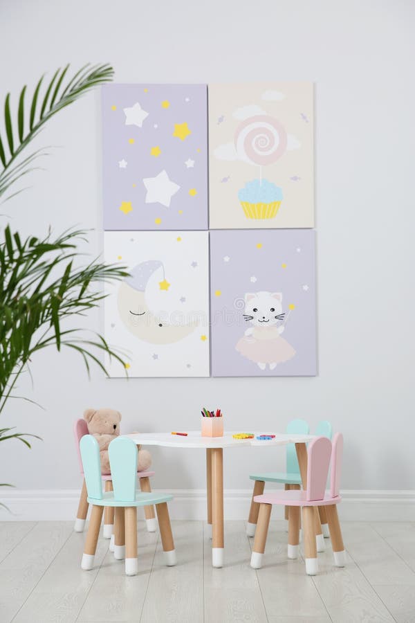 Little Table and Chairs with Bunny Ears in Children`s Room. Interior ...