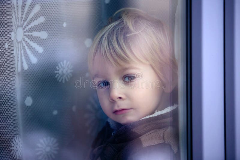 Little Boy Behind the Window in the Rain Stock Photo - Image of alone ...