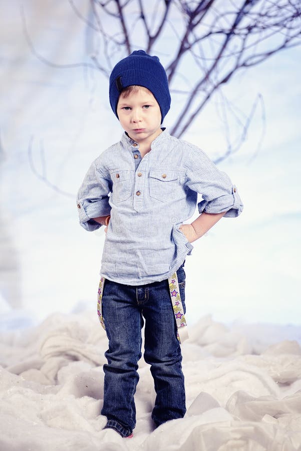 Little Boy and Girl Plays in Studio Snow Forest Background Stock Image ...