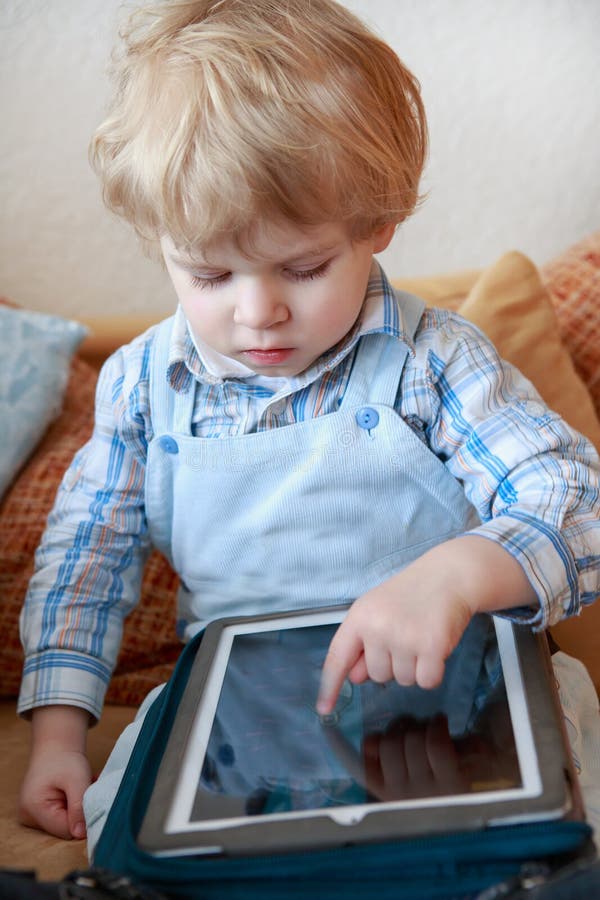 Little Toddler Boy of Two Years Playing with Tablet Pc . Stock Image ...