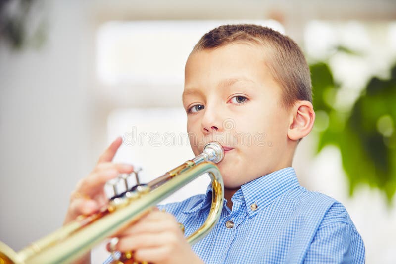 Little trumpeter stock image. Image of artist, baby, learn - 61223711