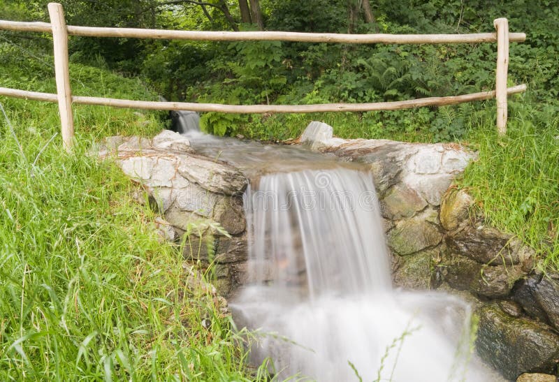 Little Waterfall with Railing Stock Image - Image of spring, rural: 6950405