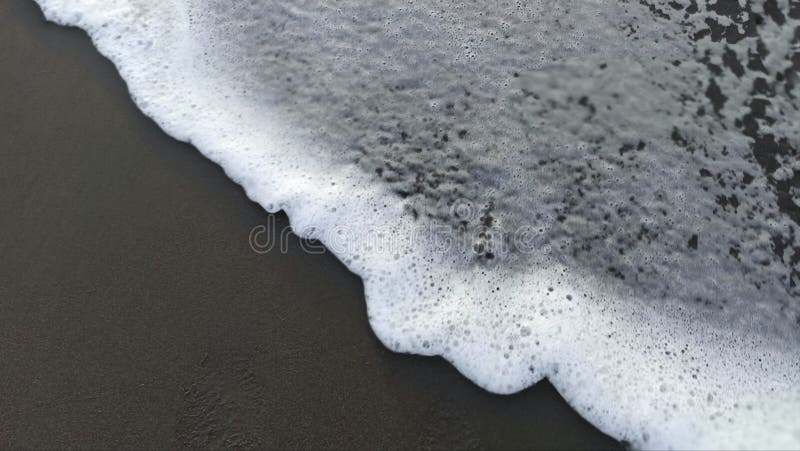 Little Wave on the Black Sand Beach Stock Image - Image of wave, beach ...
