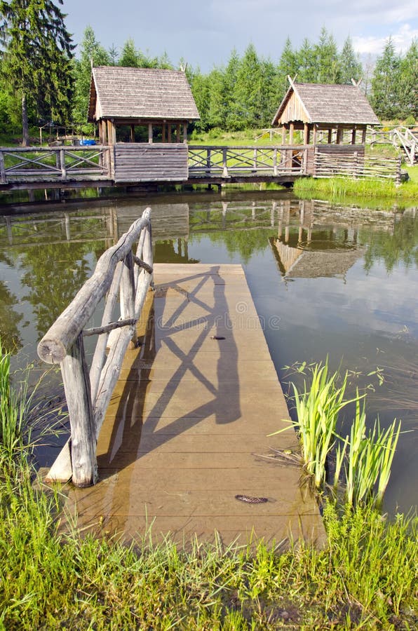 Little Wooden Bridge on Resort Pond Stock Photo - Image of water ...