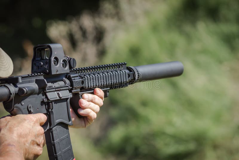 Live Fire Machine Gun with Silencer Stock Photo - Image of shooting ...