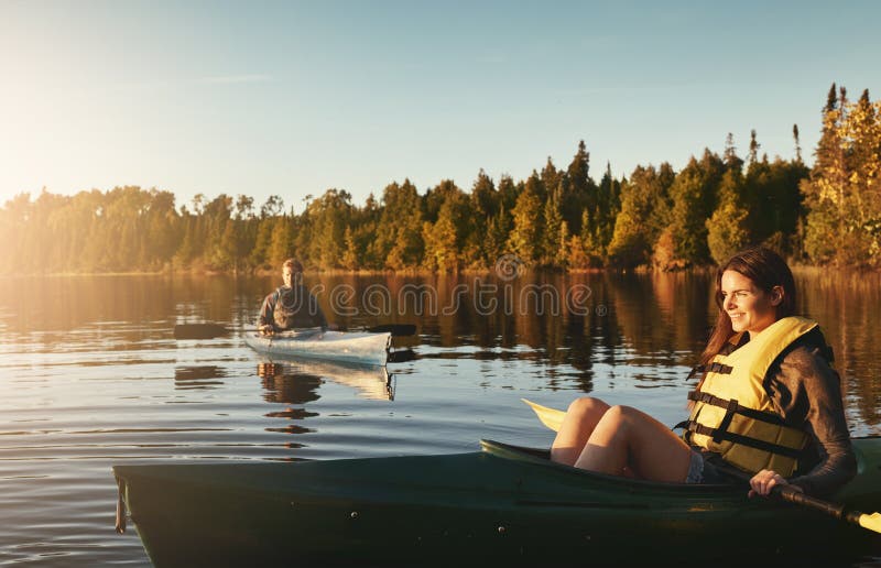 Live and Go Kayaking. a Young Couple Kayaking on a Lake Outdoors. Stock ...