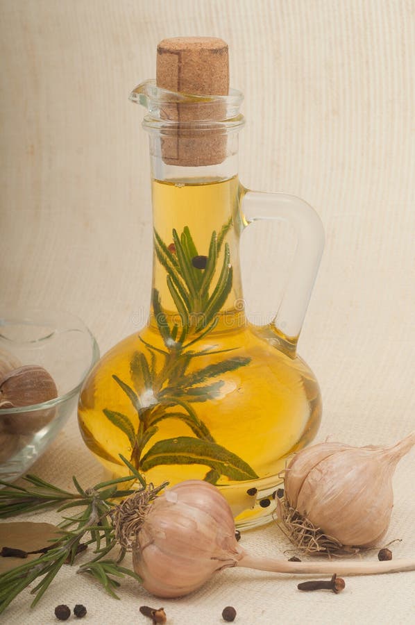 Live Oil with Spices and Garlic Stock Photo - Image of spice, pepper ...