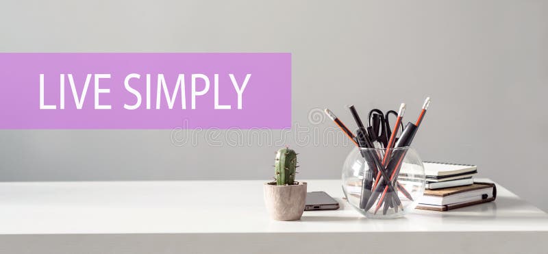 LIVE SIMPLY - Text on the Background of the Office Table. Business ...
